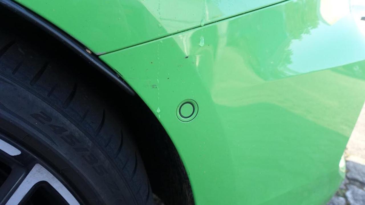 Groene Audi RS 3 limousine bij Domeinen